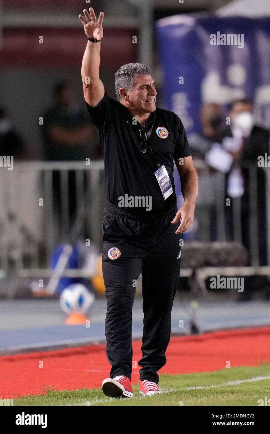 Costa Rica's coach Luis Fernando Suarez instructs his players during a ...