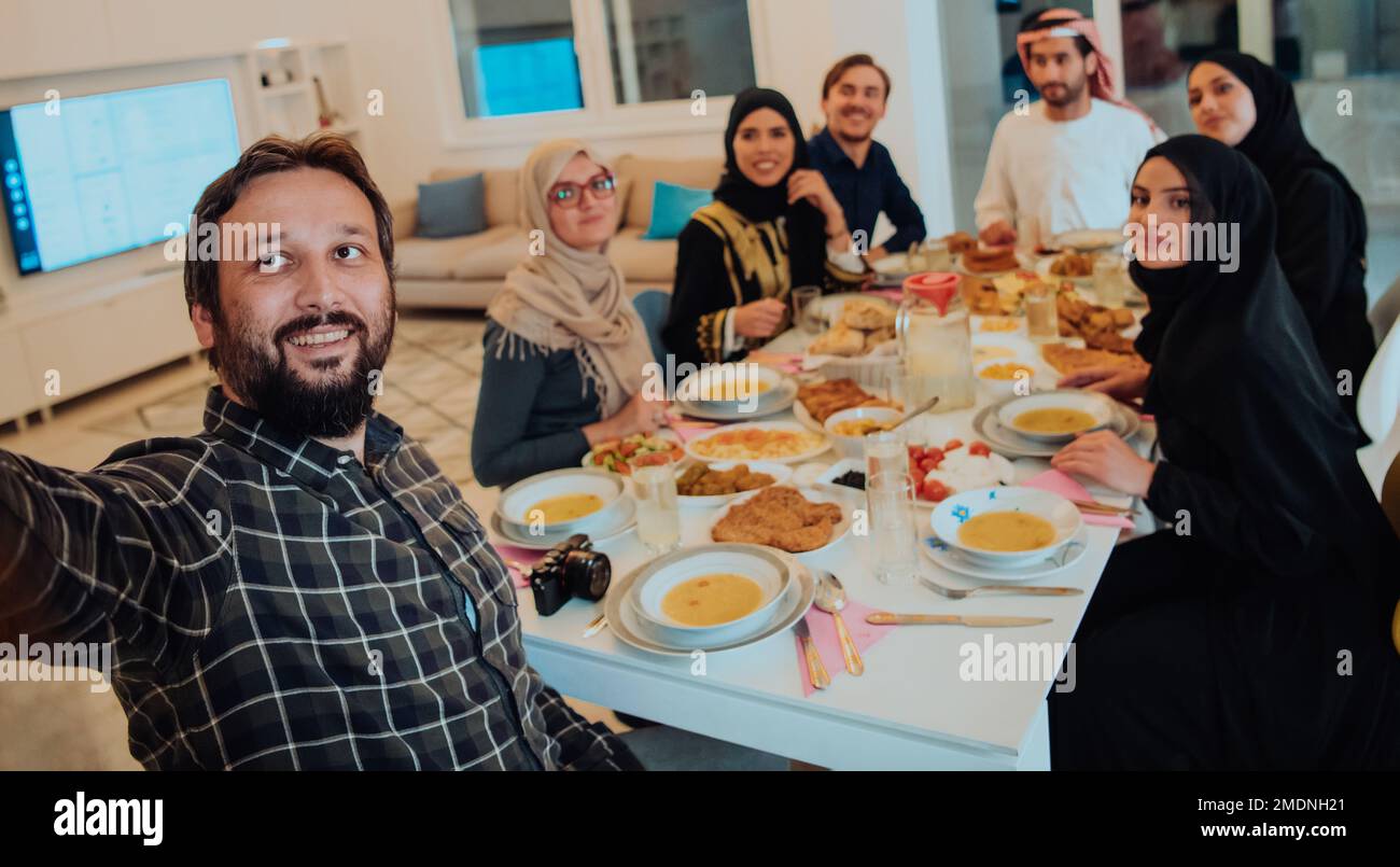 Eid Mubarak Muslim family having Iftar dinner taking pictures with ...