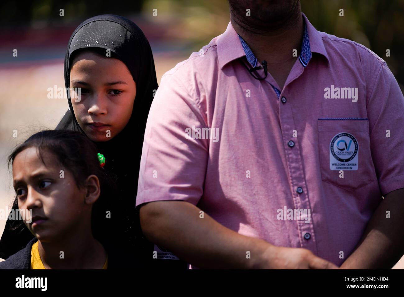 Palwasha Faizi, 10, above left, stands behind her sister, Parwana Faizi ...