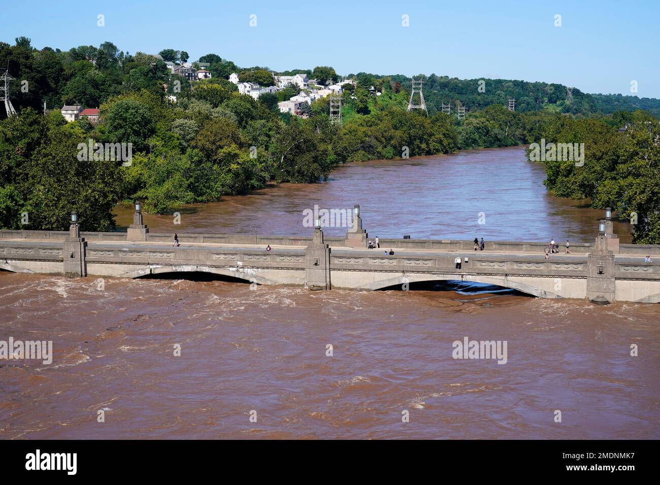 The Schuylkill River exceeds its bank in the Manayunk section of ...