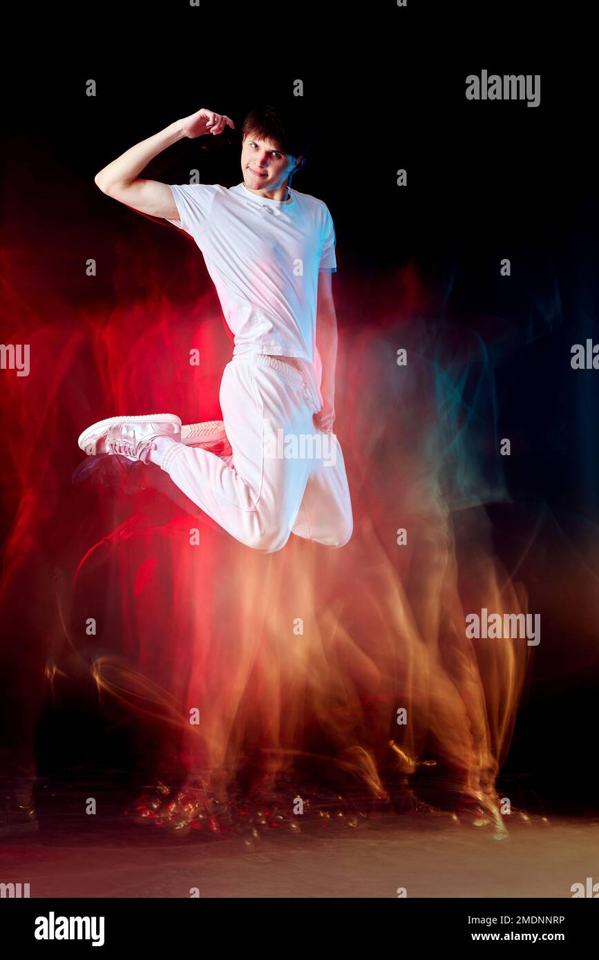 Teen boy neon light hi-res stock photography and images - Alamy