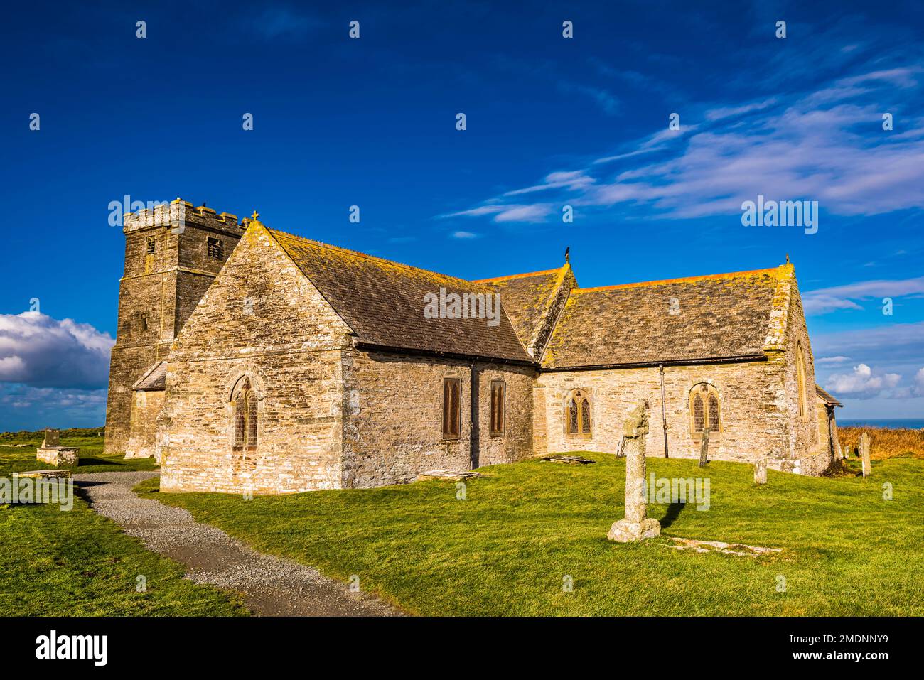 Low winter sun over St Materiana's Church, Tintagel, Cornwall, UK Stock ...