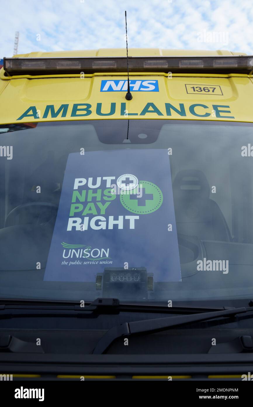An ambulance with a sign on the dashboard, outside Leeds Ambulance ...