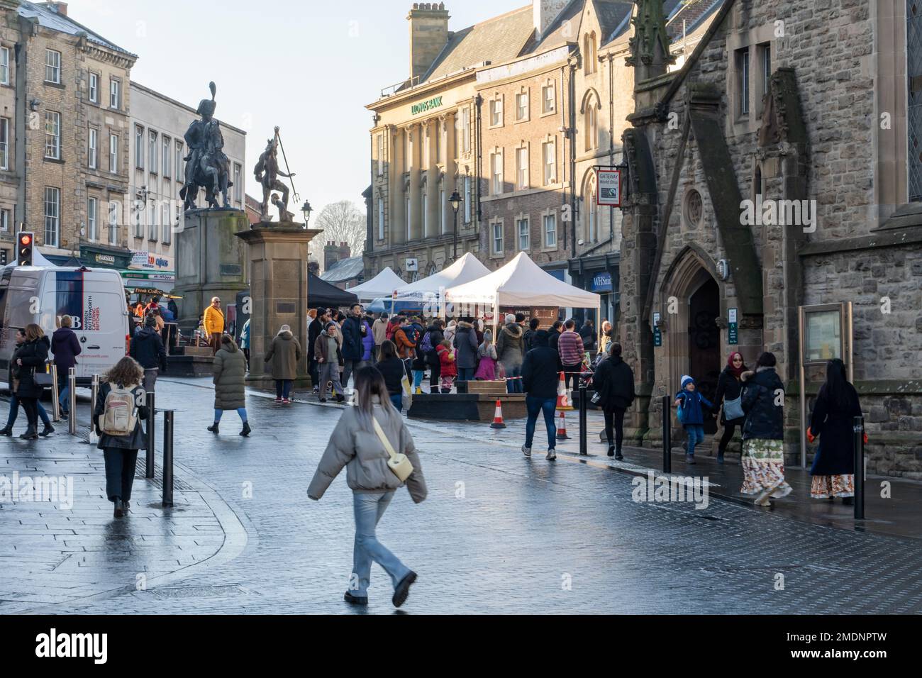 People passing by at the Market Square in the city of Durham, UK, in ...