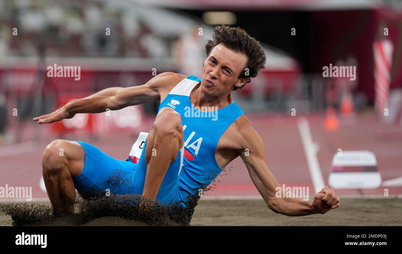 Italy's Marco Cicchetti competes during the men's long jump T64 final ...