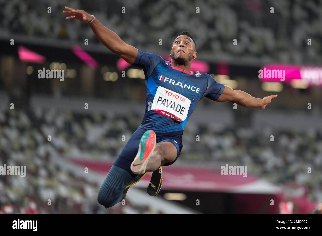 France's Dimitri Pavade competes during the men's long jump T64 final ...
