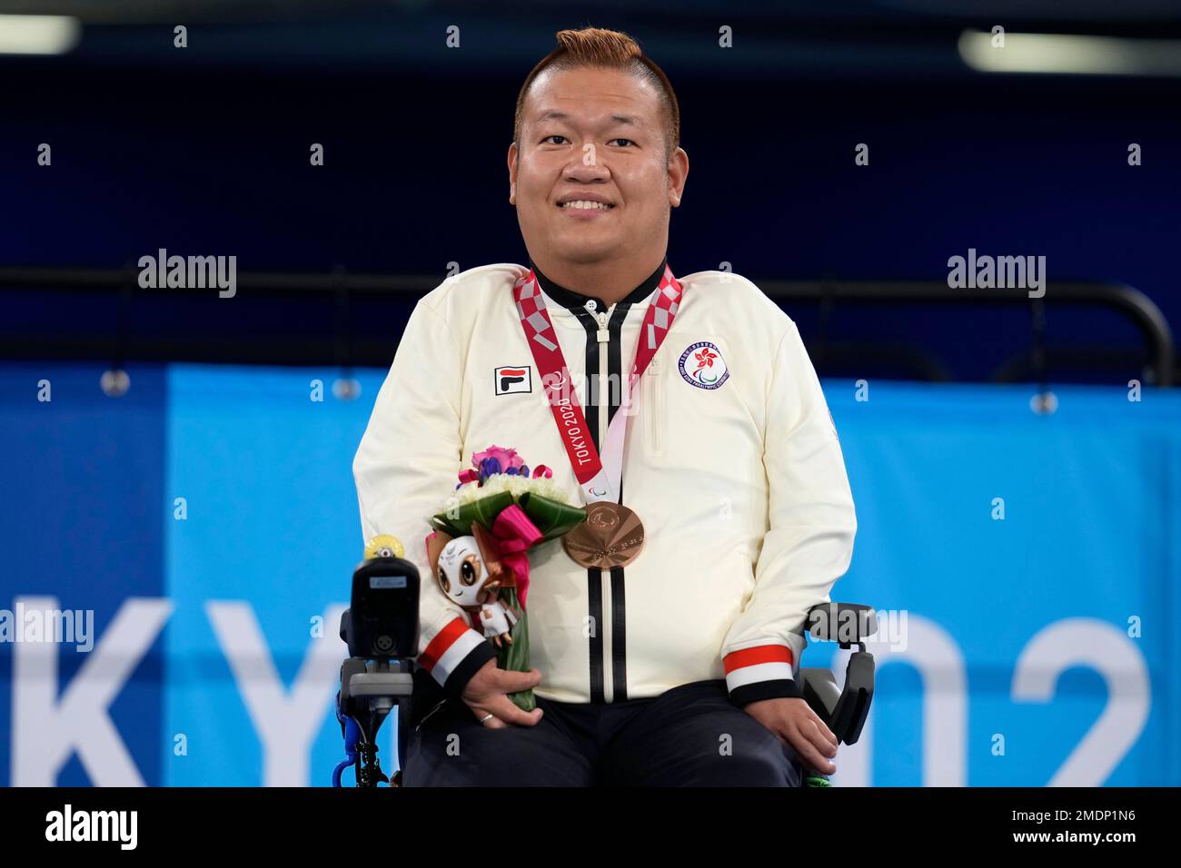 Hong Kong's Leung Yuk Wing poses with the bronze medal during the ...