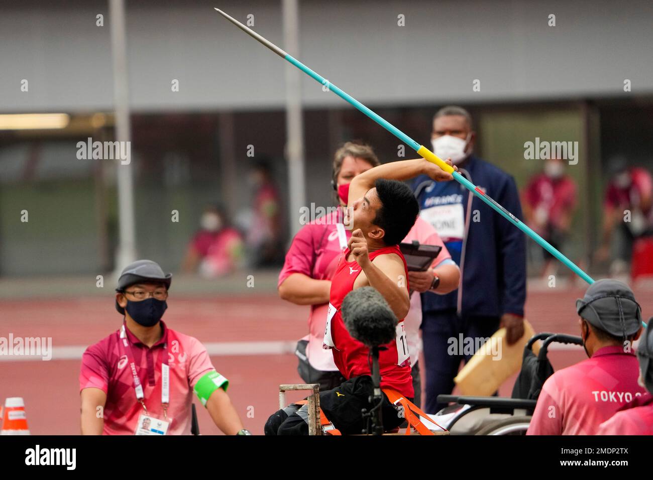 China's Zhang Zhongqiang competes in the men's seated F34 javelin throw ...