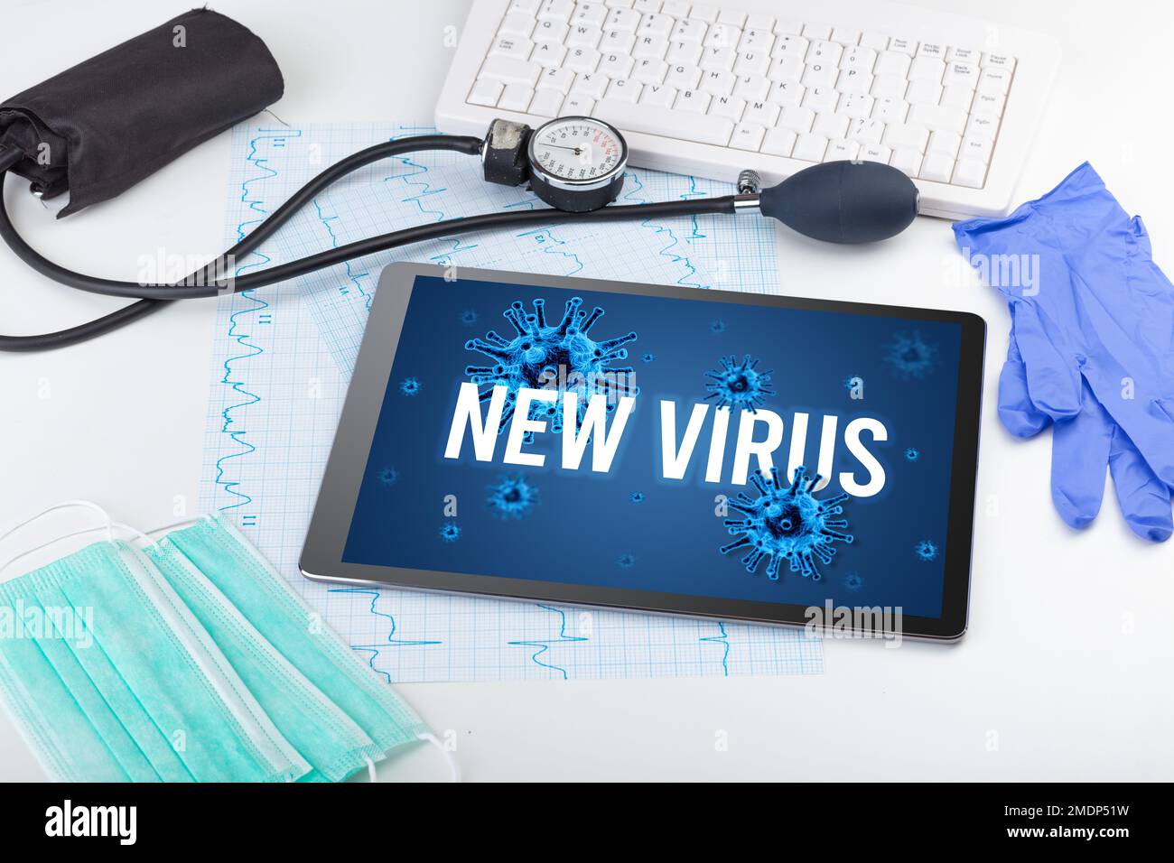Tablet pc and doctor tools on white surface Stock Photo - Alamy