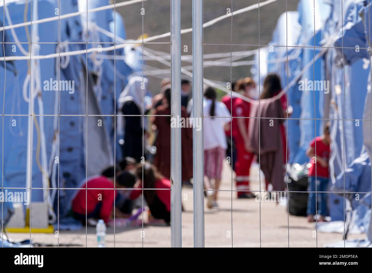 Afghan refugees in an Italian Red Cross refugee camp, in Avezzano ...