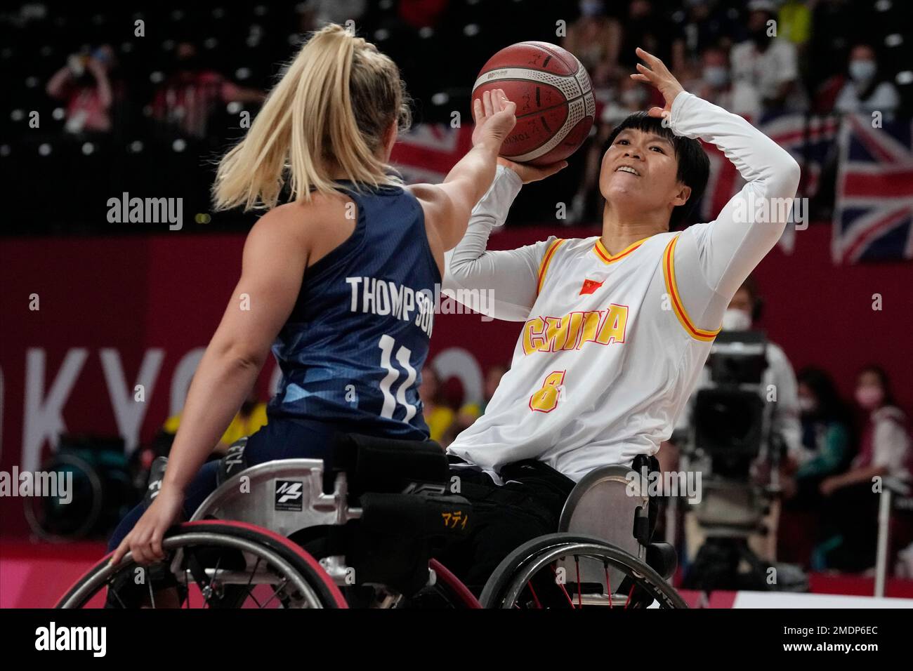 China's Lyu Guidi (8) shoots against Britain's Madeleine Thompson (11 ...