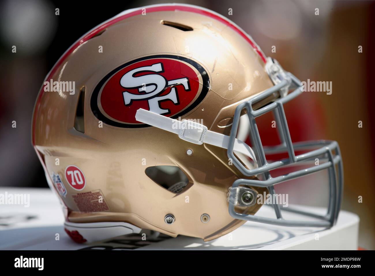 A San Francisco 49ers helmet sits on the sideline during an NFL ...