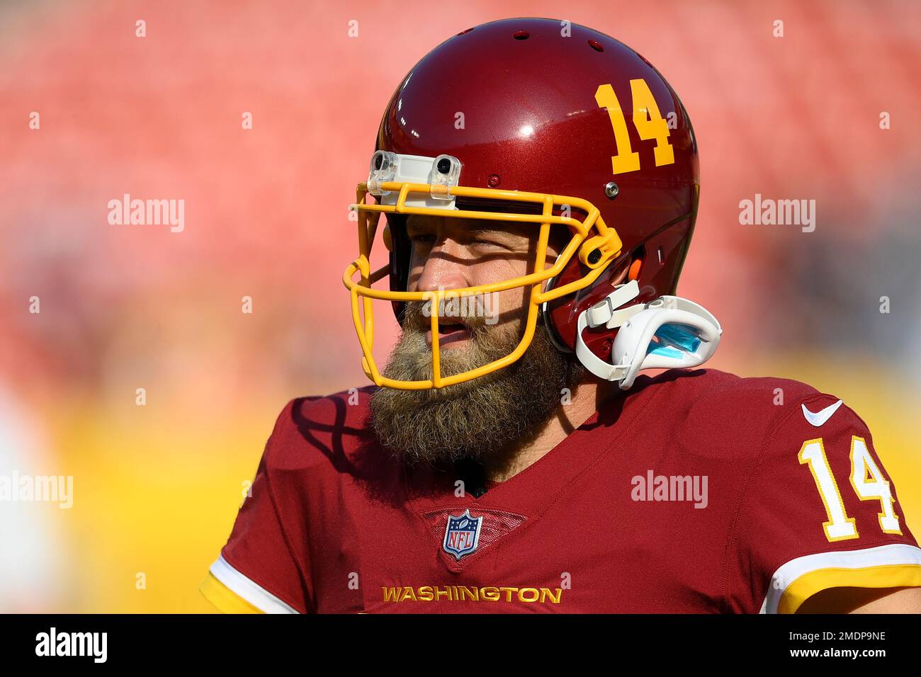 Washington Football Team quarterback Ryan Fitzpatrick (14) warms up ...