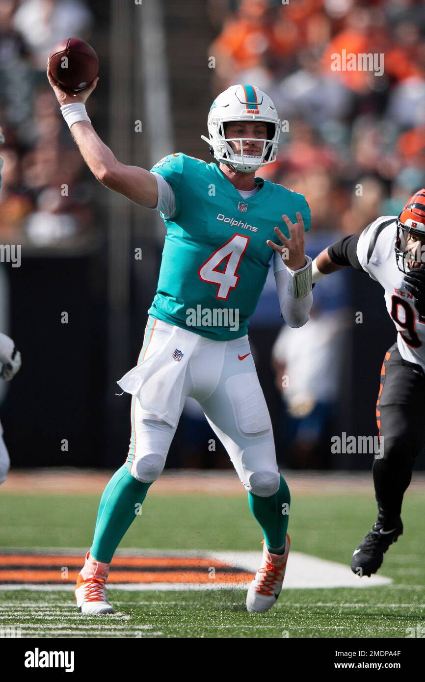 Miami Dolphins quarterback Reid Sinnett (4) throws on the run during an ...
