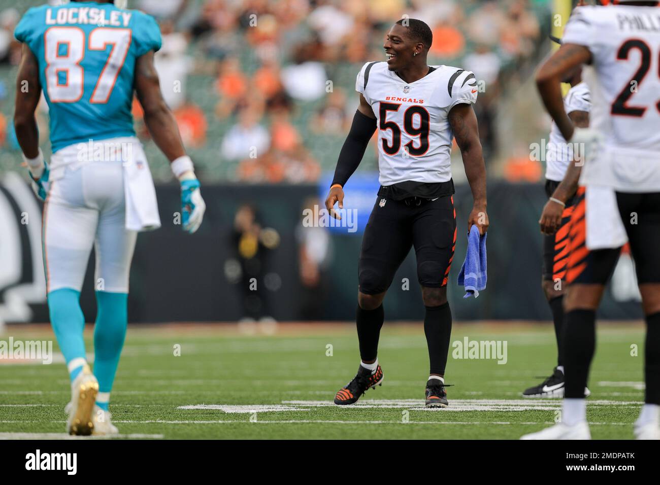 Cincinnati Bengals' linebacker Akeem Davis-Gaither (59) smiles as he ...