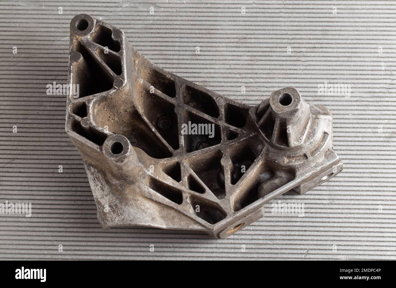 Aluminum pad and car engine mount Stock Photo - Alamy