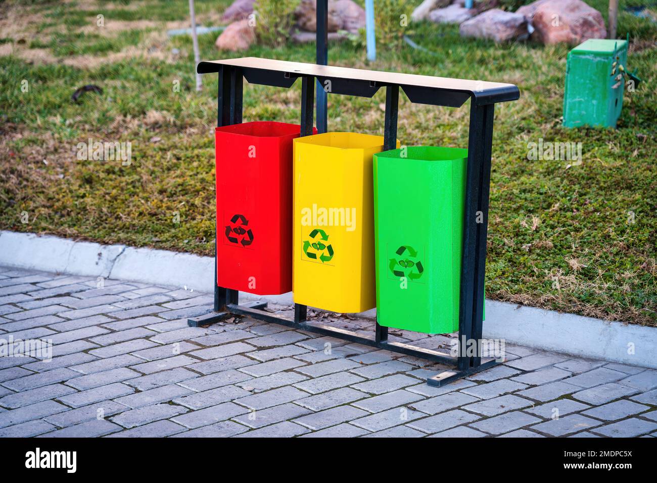 Iron multi-colored containers for separate waste collection. Waste ...