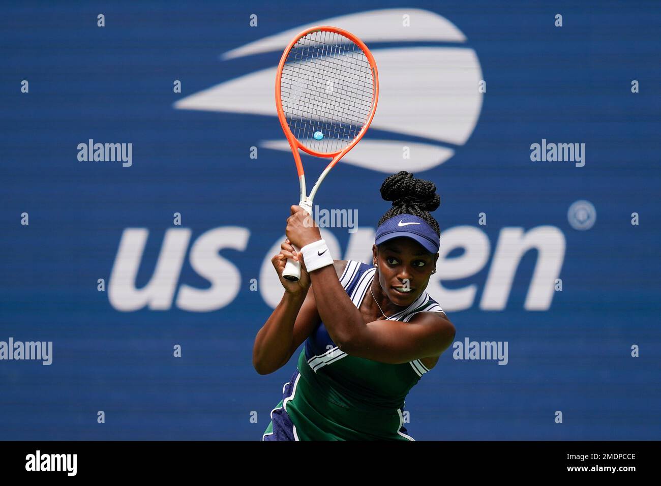 Sloane Stephens, of the United States, returns a shot to Madison Keys ...