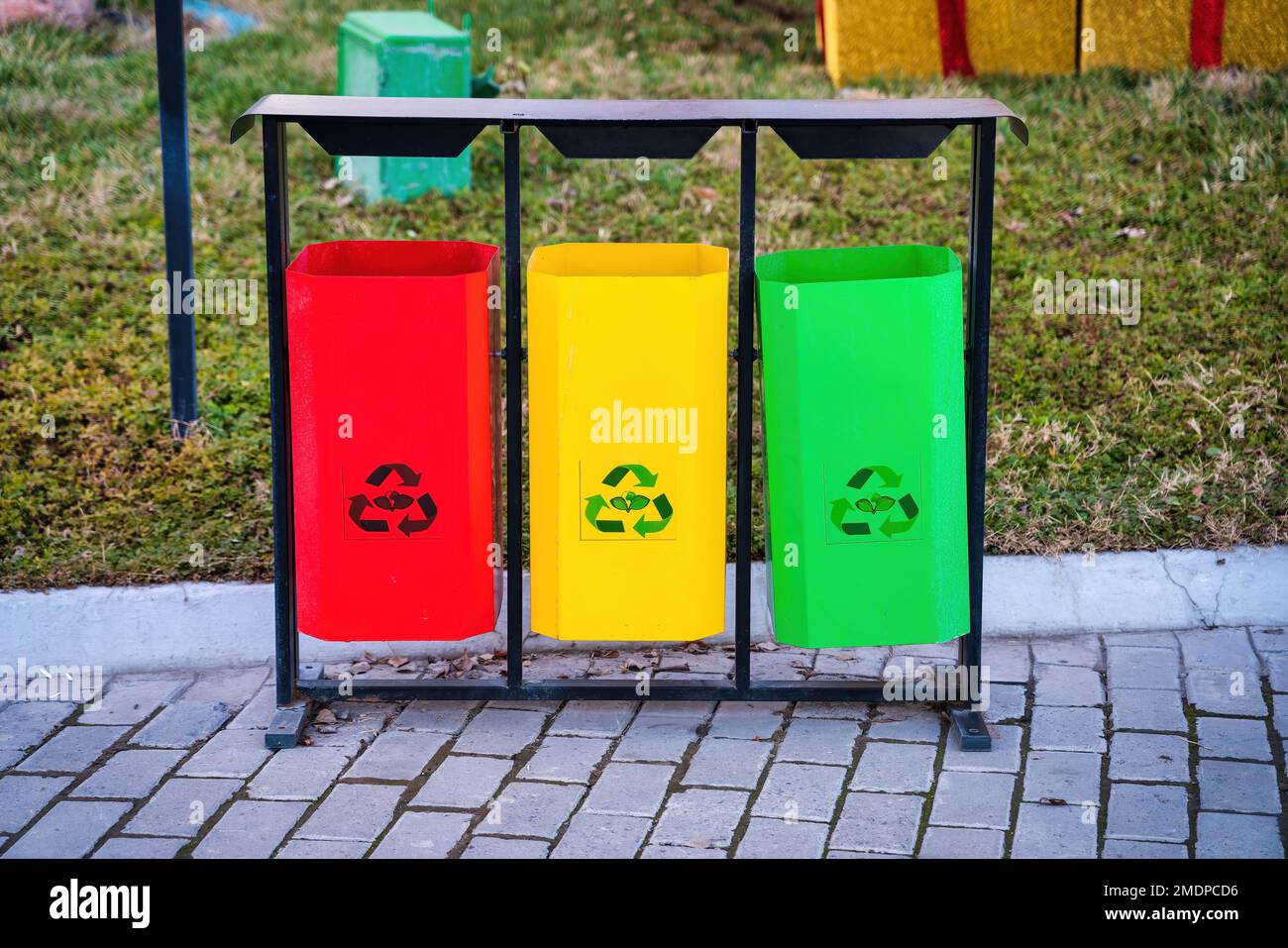 Iron multi-colored containers for separate waste collection. Waste ...