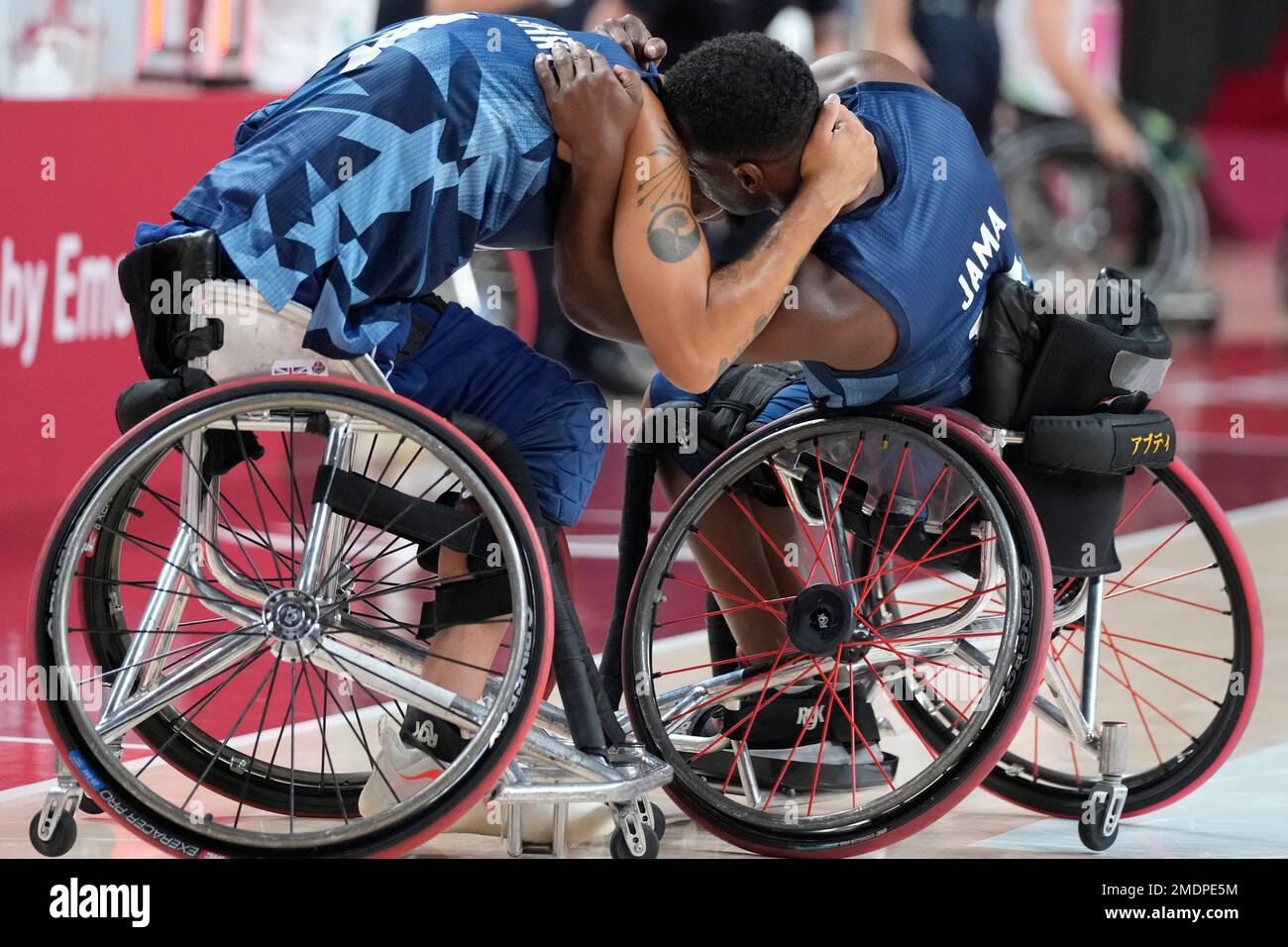 Britain's Gaz Choudhry, left, and and Abdi Jama celebrate after winning ...