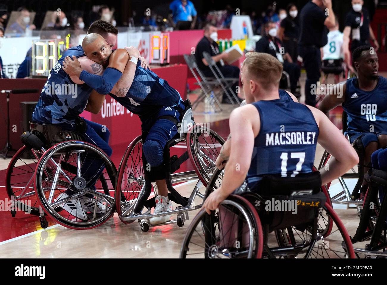 Britain's Gaz Choudhry, second from left, and teammates celebrate after ...