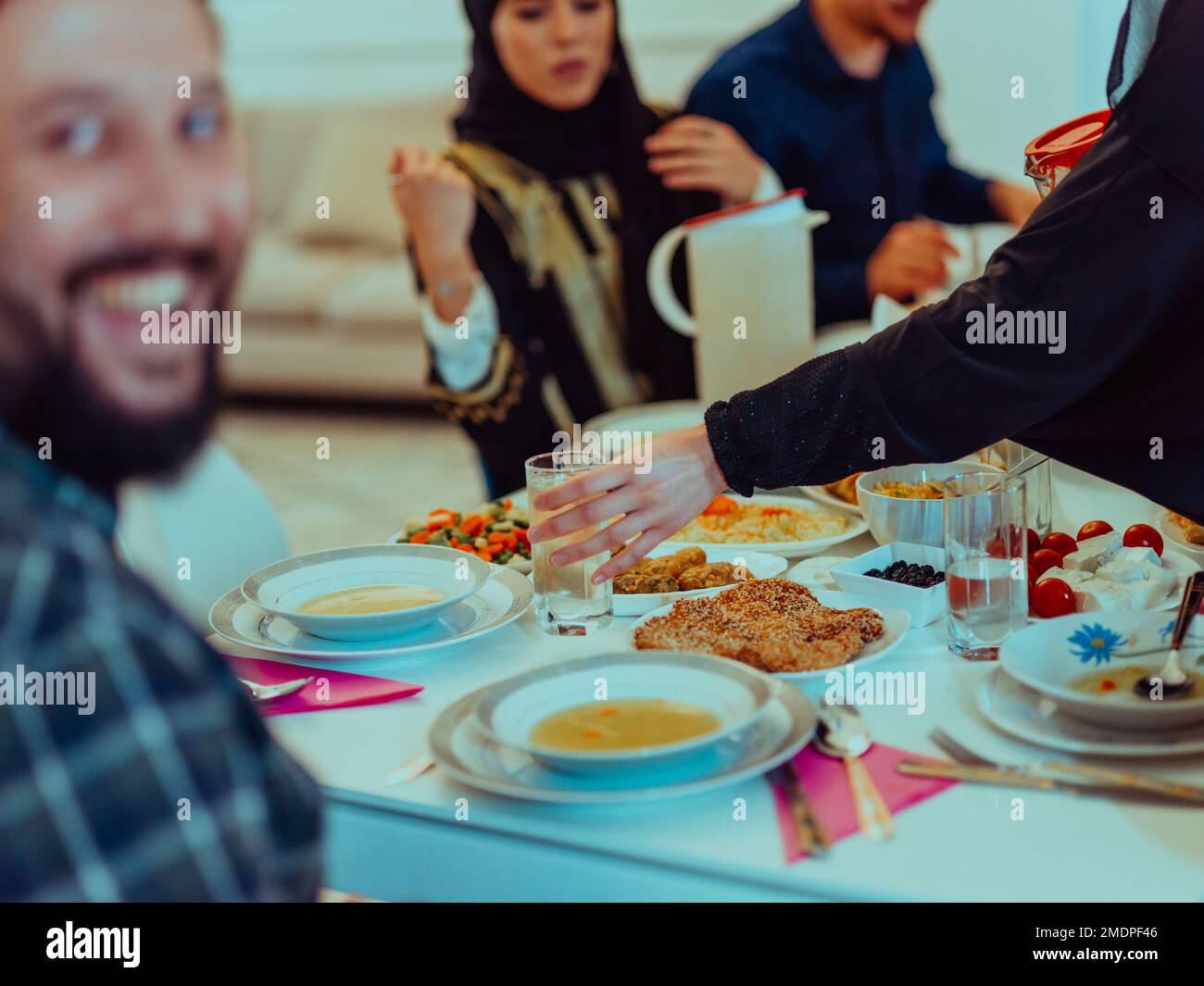 Eid Mubarak Muslim family having Iftar dinner taking pictures with ...