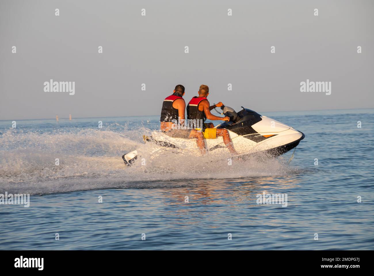 Teen on jet ski hi-res stock photography and images - Alamy