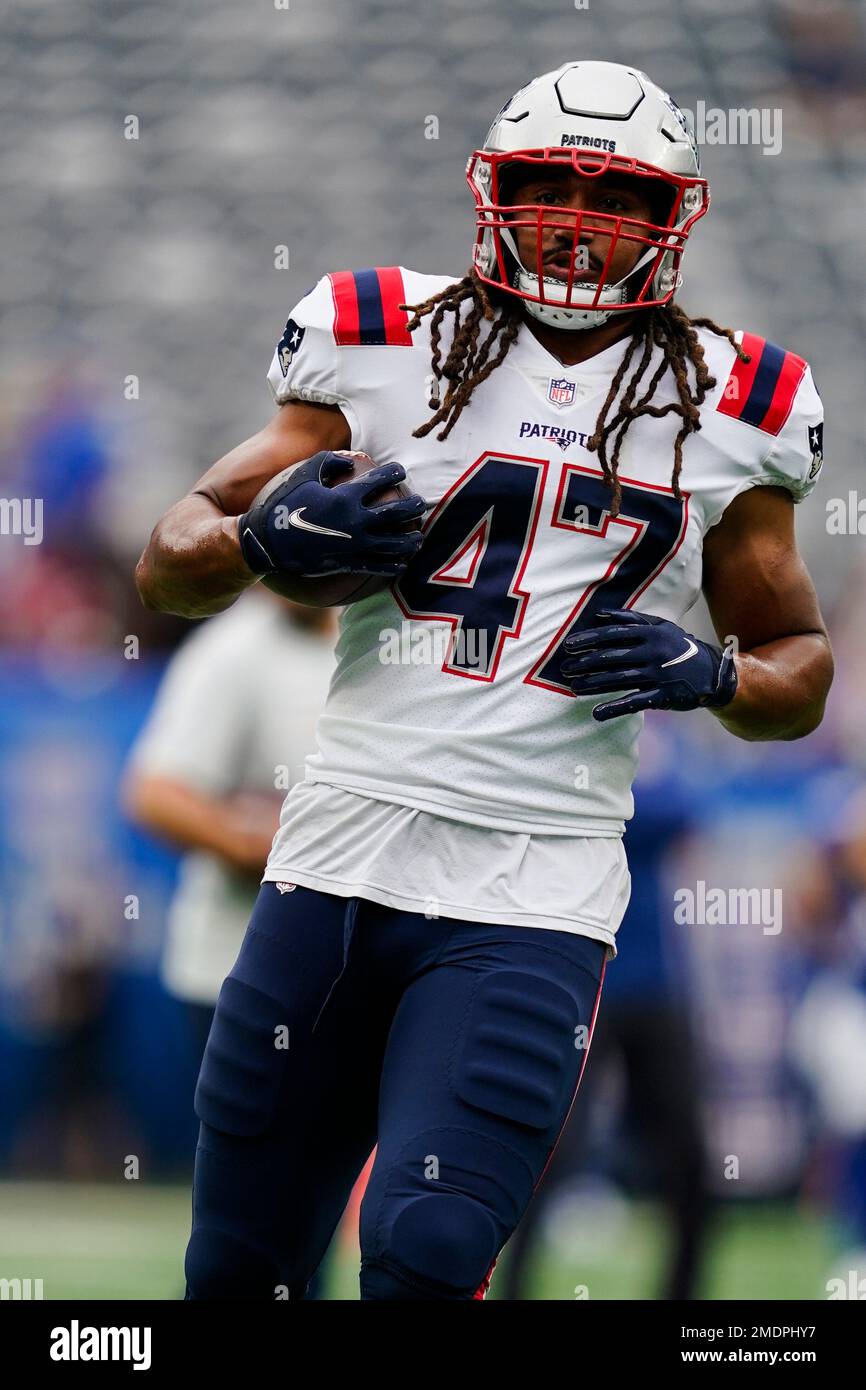 New England Patriots fullback Jakob Johnson (47) warms up before an NFL ...