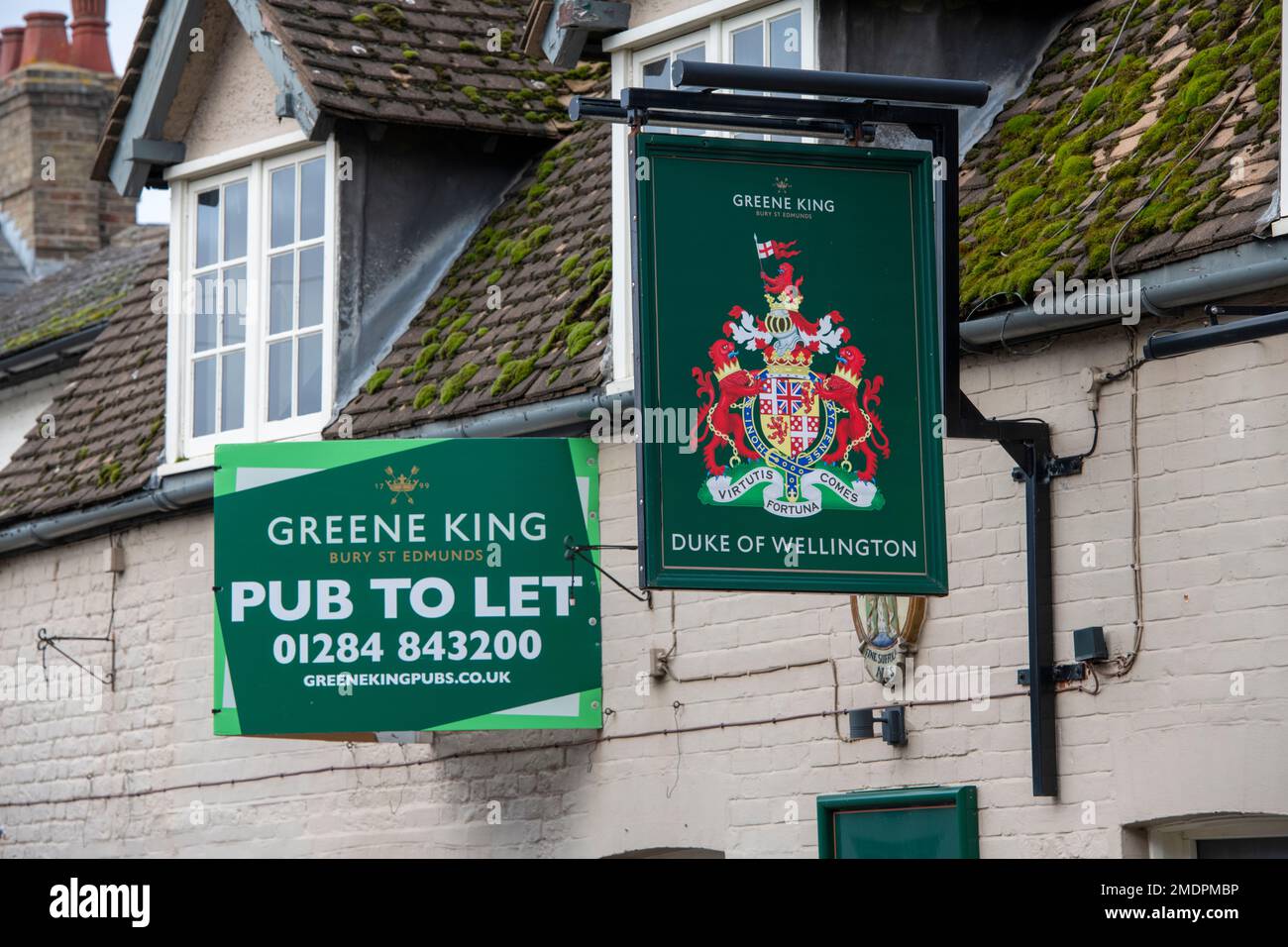 Signs on a pub to let. The Duke of Wellington pub is for rent at a time ...