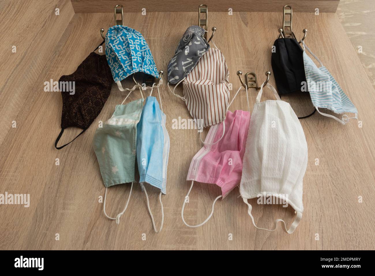 Protective face masks hang hi-res stock photography and images - Alamy