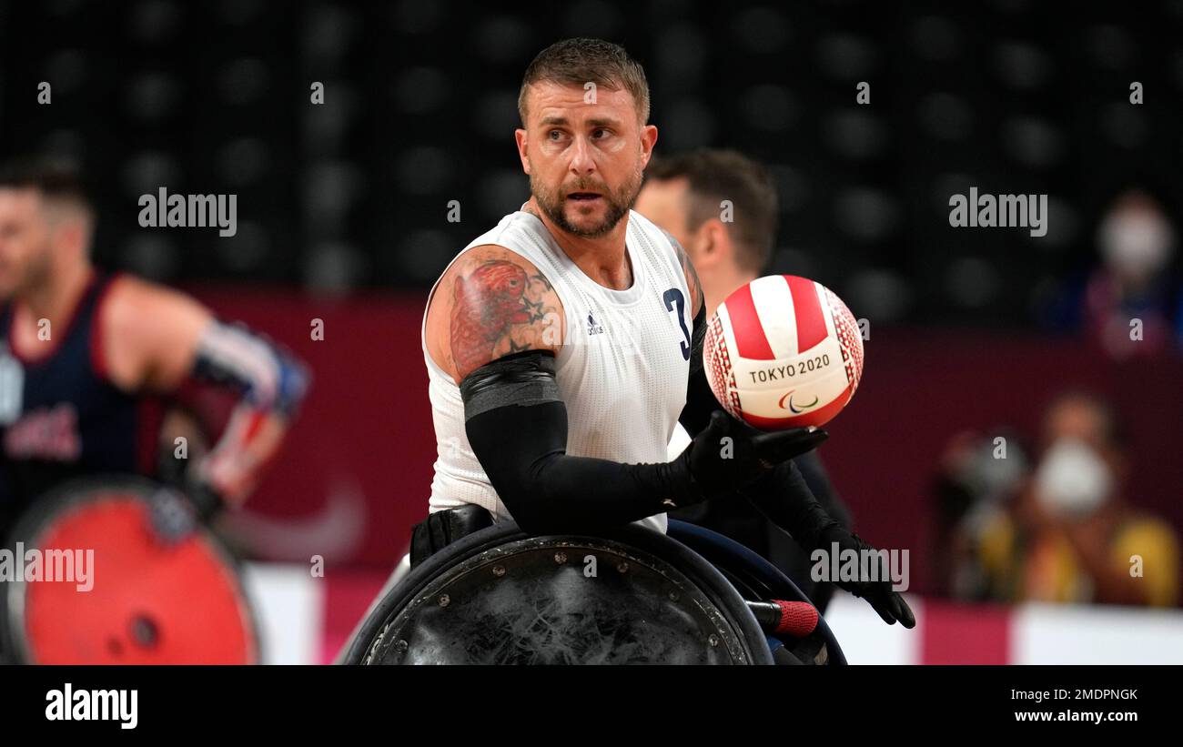 Britain's Stuart Robinson holds the ball during the wheelchair rugby ...