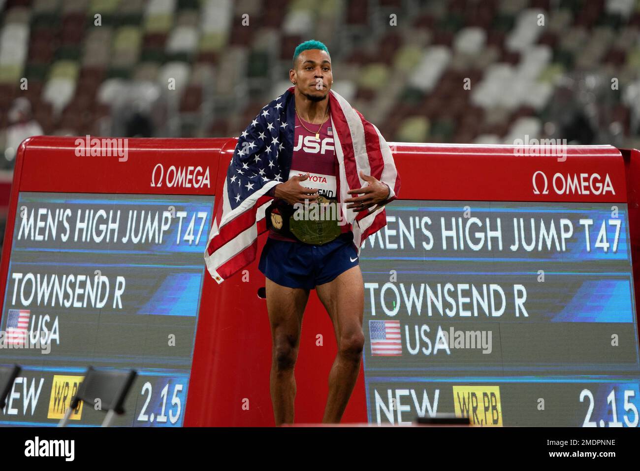 United States' Roderick Townsend poses beside the board after winning ...