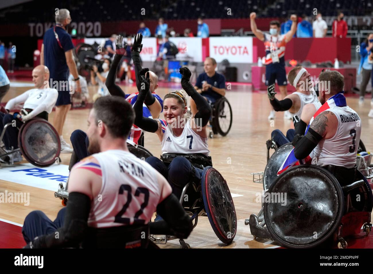Britain's Kylie Grimes (7) and her teammates celebrate after winning ...