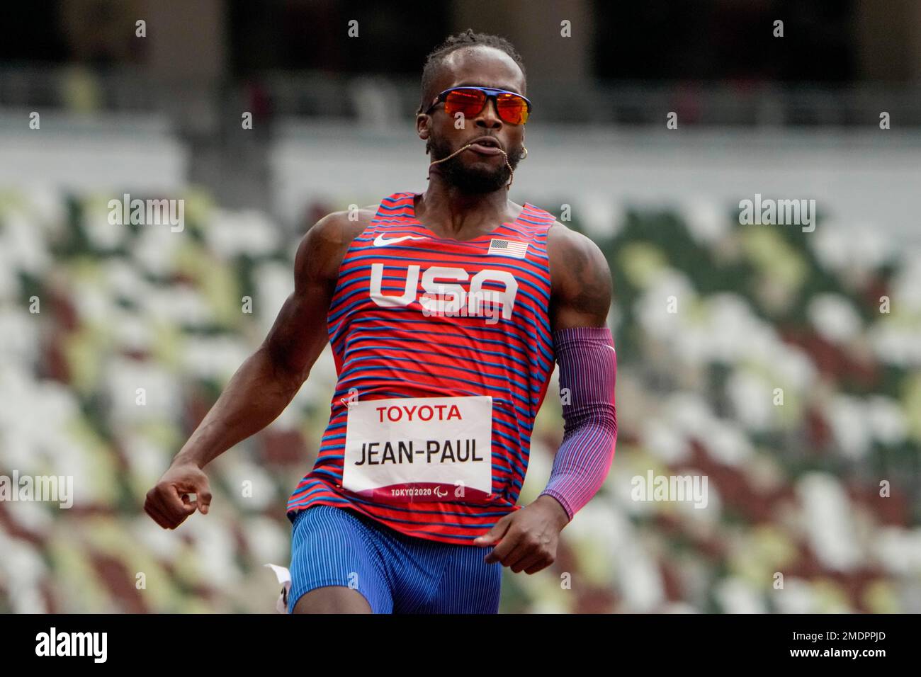 United States' Isaac Jean-Paul competes in his heat of the T13 men's ...
