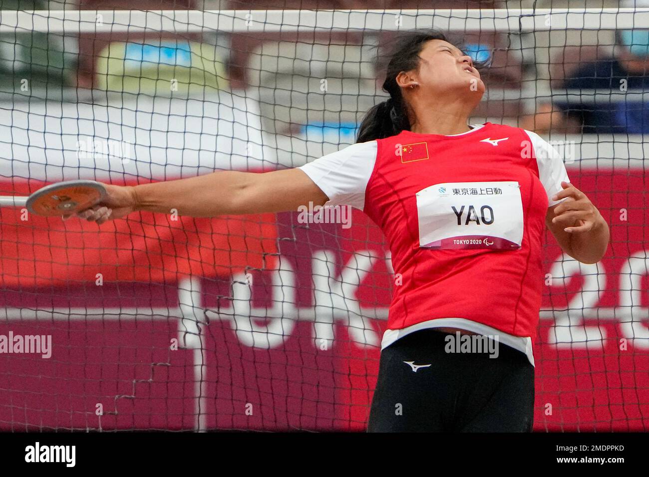China's Yao Juan throws in the women's F44 discus final during the 2020 ...
