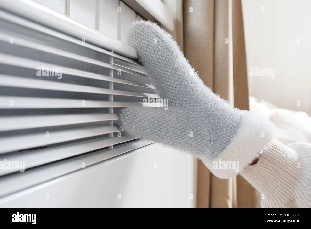 Warming hands heater hi-res stock photography and images - Alamy