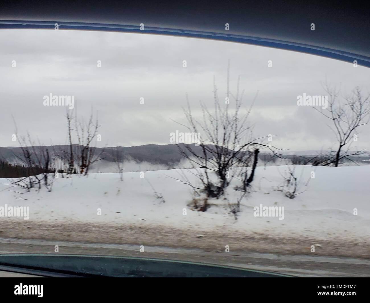 A foggy weather in the mountains on a winter day Stock Photo - Alamy