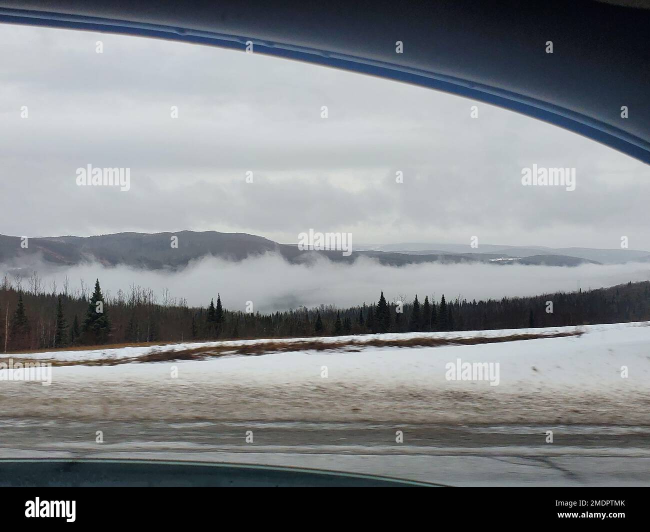 A foggy weather in the mountains on a winter day Stock Photo - Alamy