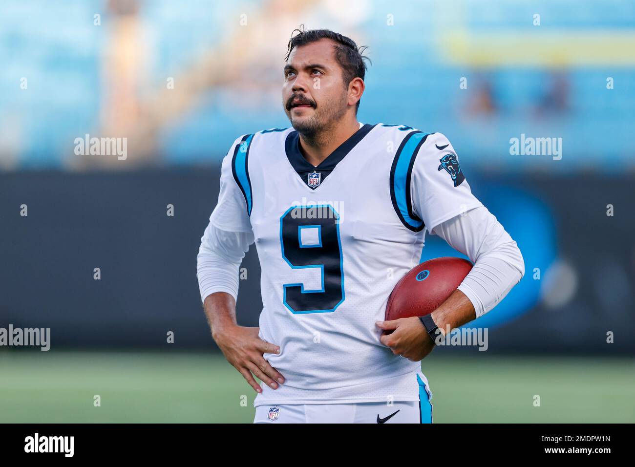 Carolina Panthers kicker Ryan Santoso warms up before a preseason NFL ...
