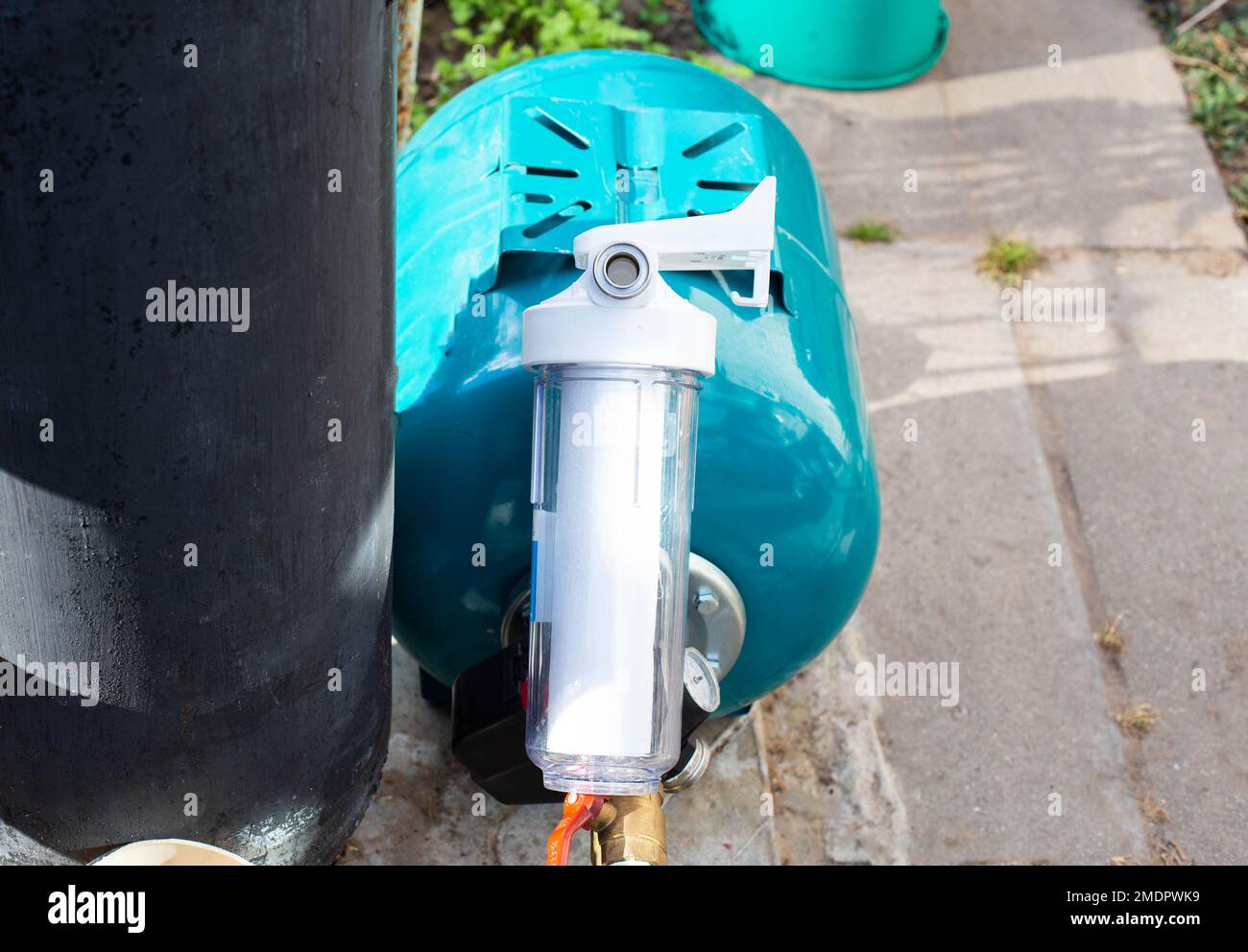 The system of modern water supply in a country house from a well source ...