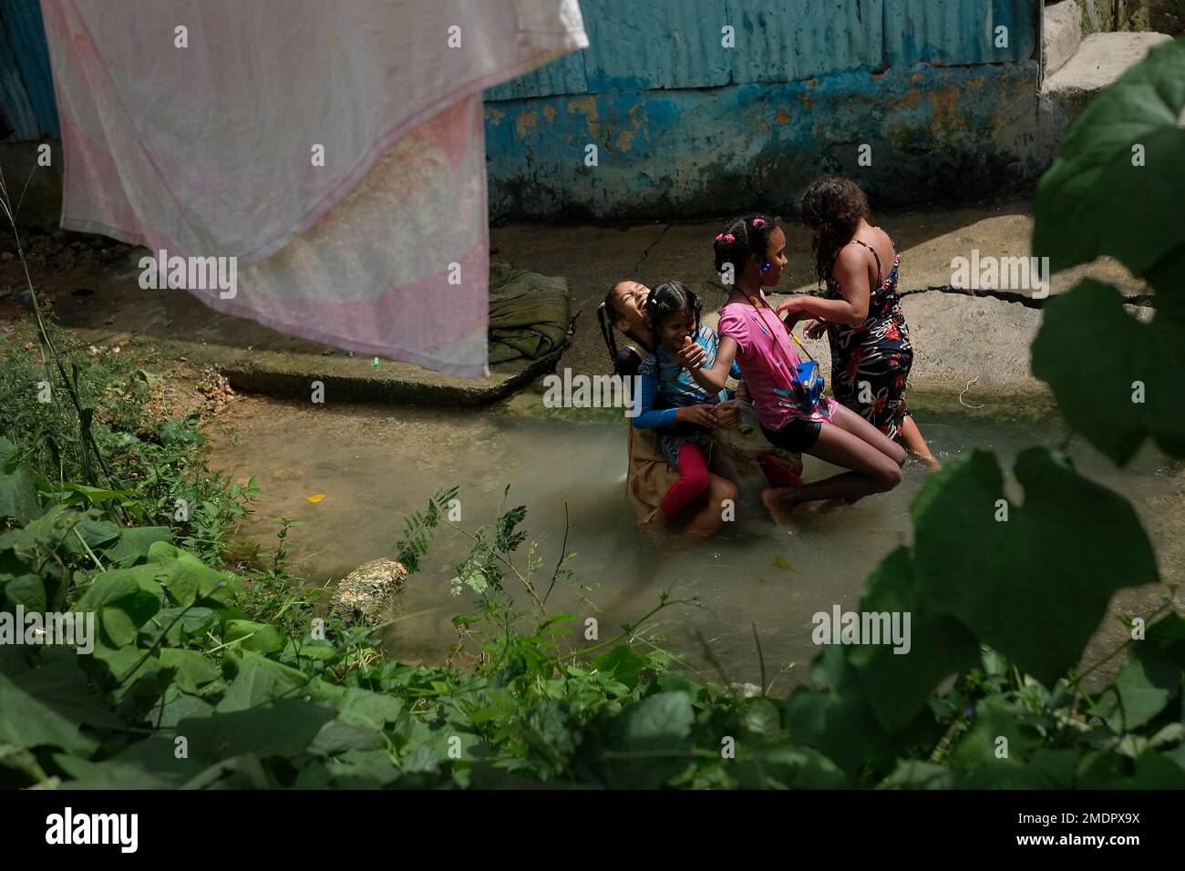 Girls play in the Gualey neighborhood of Santo Domingo, Dominican ...