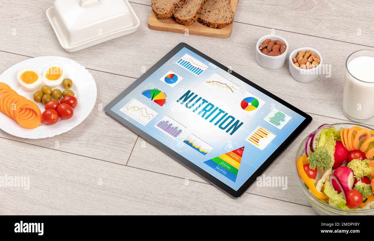 Organic food and tablet pc Stock Photo - Alamy