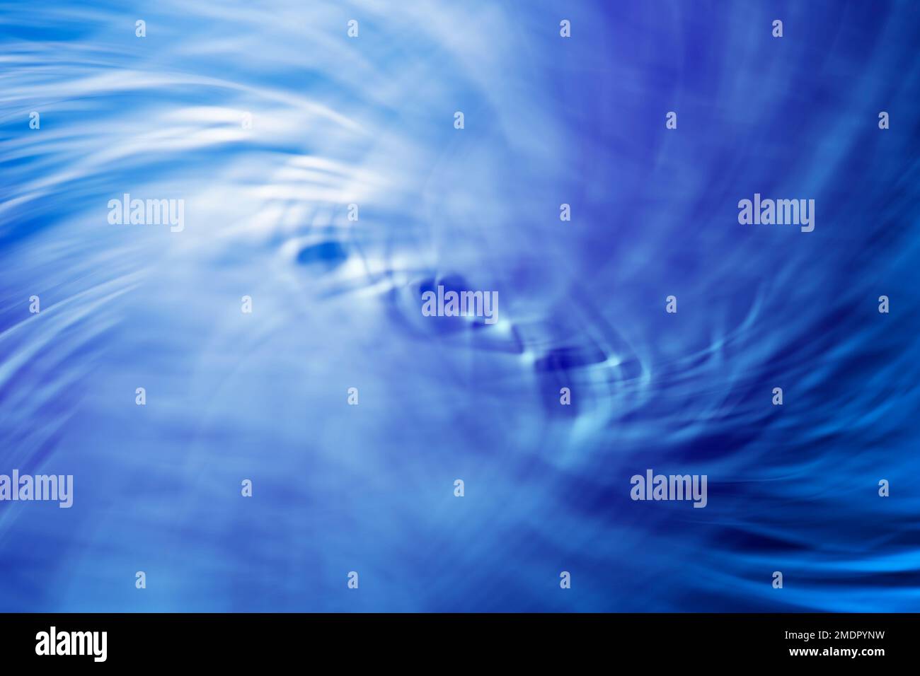 Texture of an aqueous blue water stream with twists and swirls Stock ...