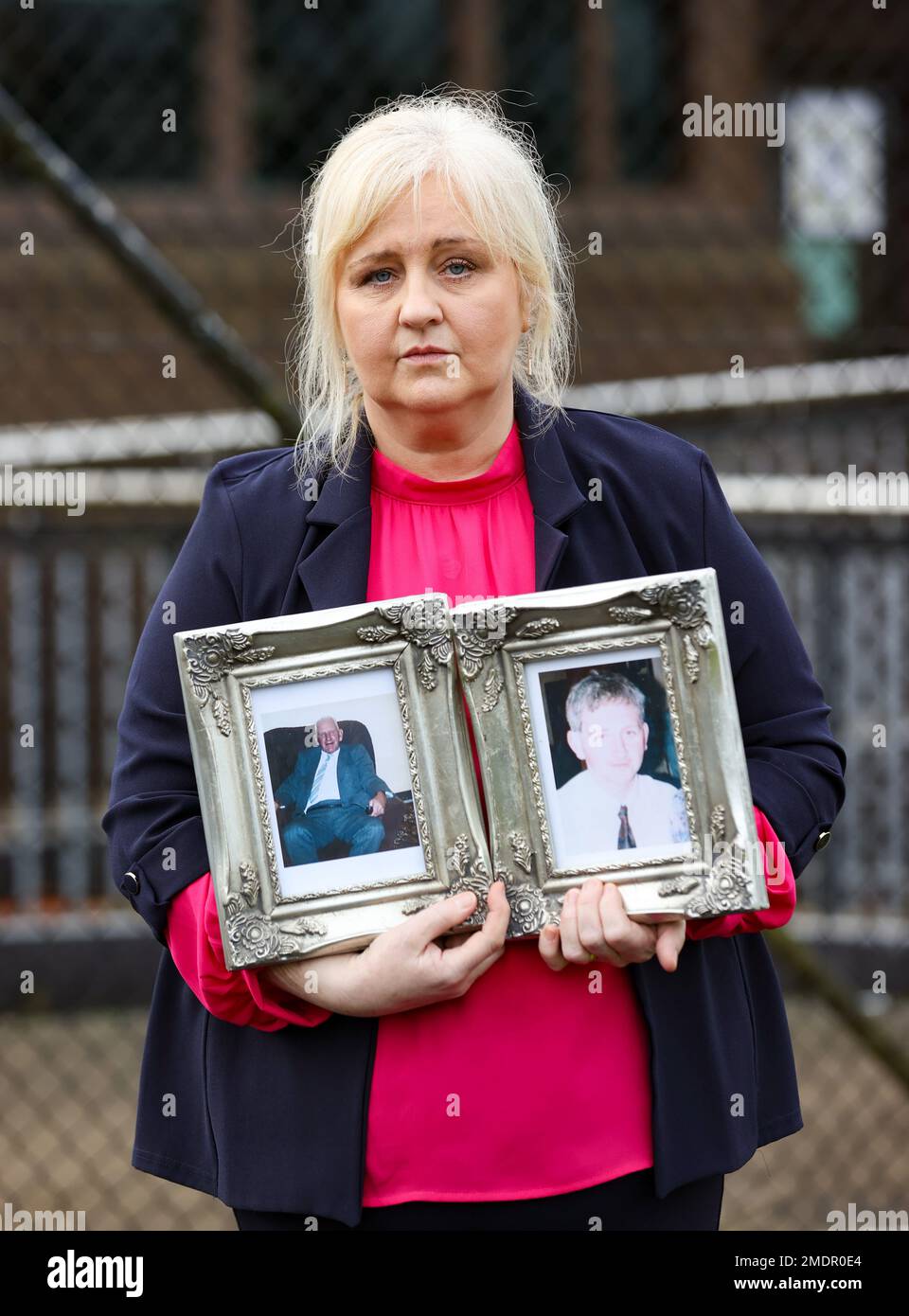Angela McKearney holding an image of her uncle John (Jack) McKearney ...