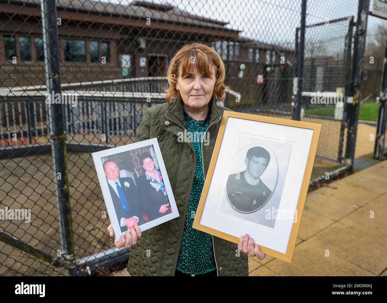 Bernadette McKearney, widow of Kevin McKearney, holding an image of her ...