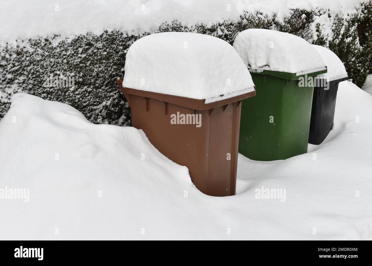 Garbage bin covered with snow hi-res stock photography and images - Alamy