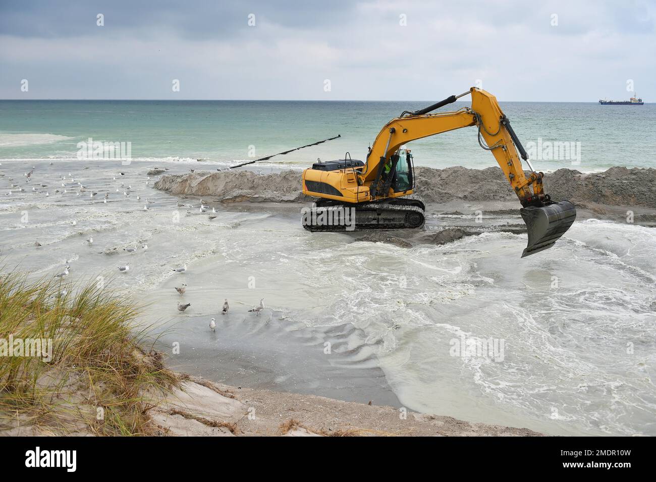 Dredger for land reclamation on a construction site in the Baltic Sea ...