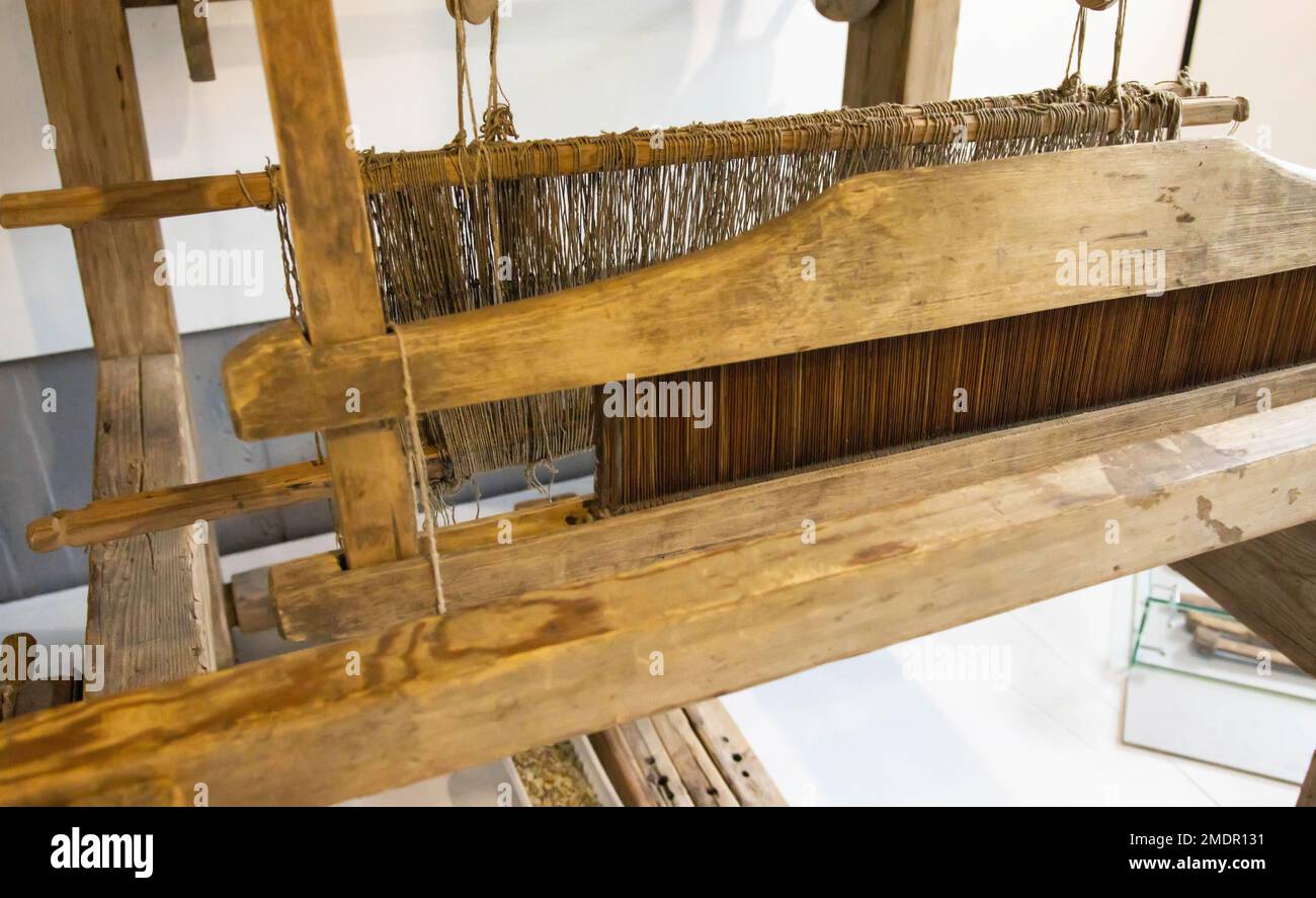 Old loom. Device for the manufacture of textile products, close-up ...