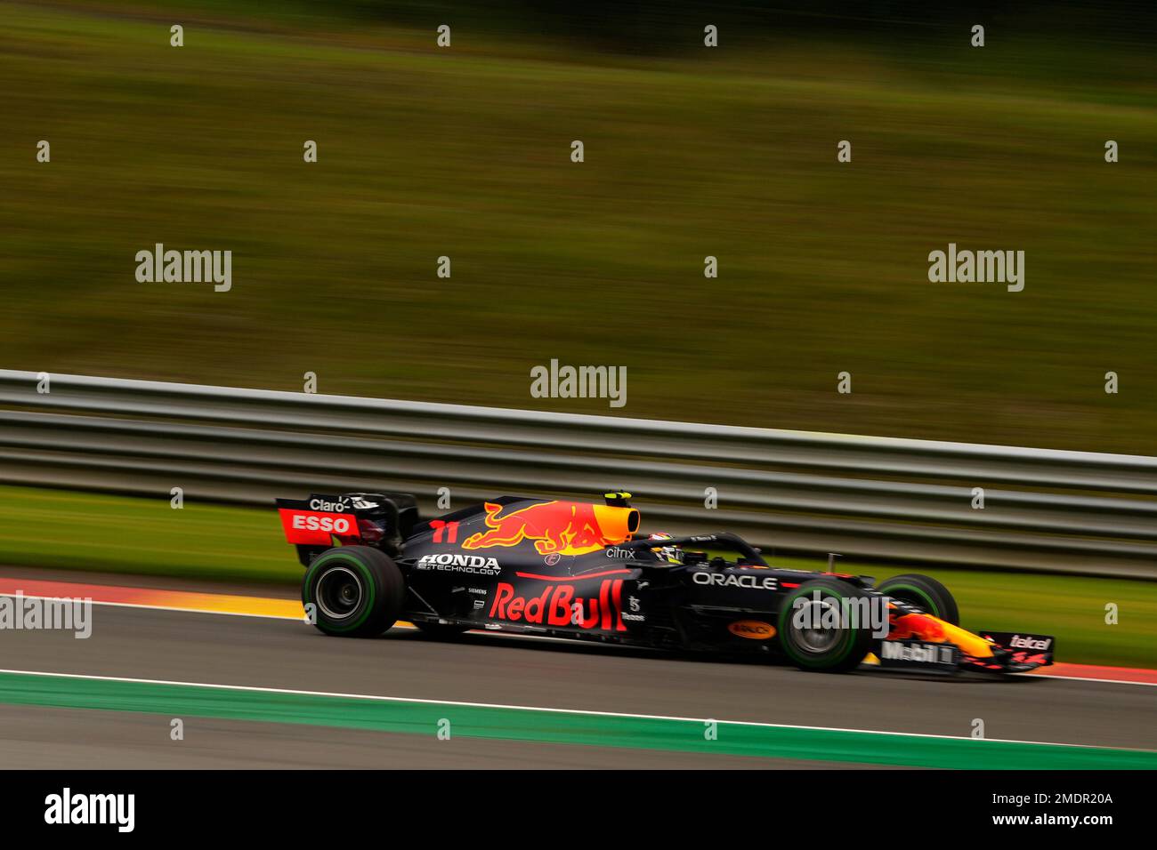 Red Bull driver Sergio Perez of Mexico steers his car during the third practice session ahead of ...
