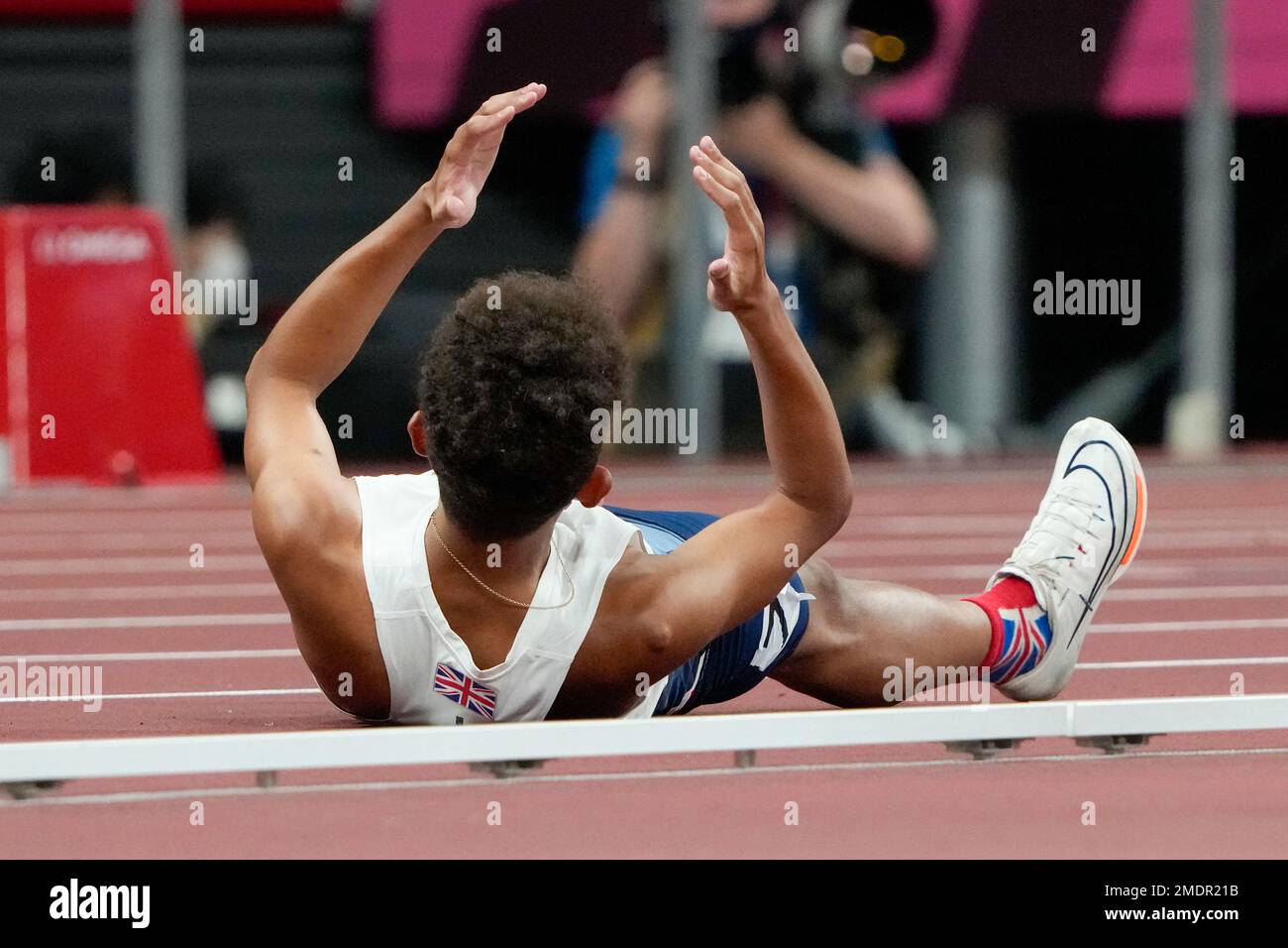 Britain's Thomas Young reacts after winning the men's T38 100-meters ...